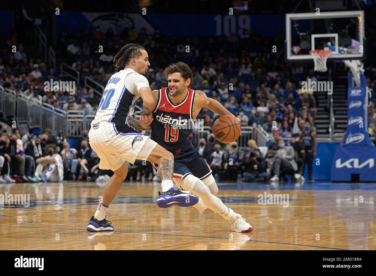 Washington Wizards guard Raul Neto (19) is fouled by Orlando Magic ...
