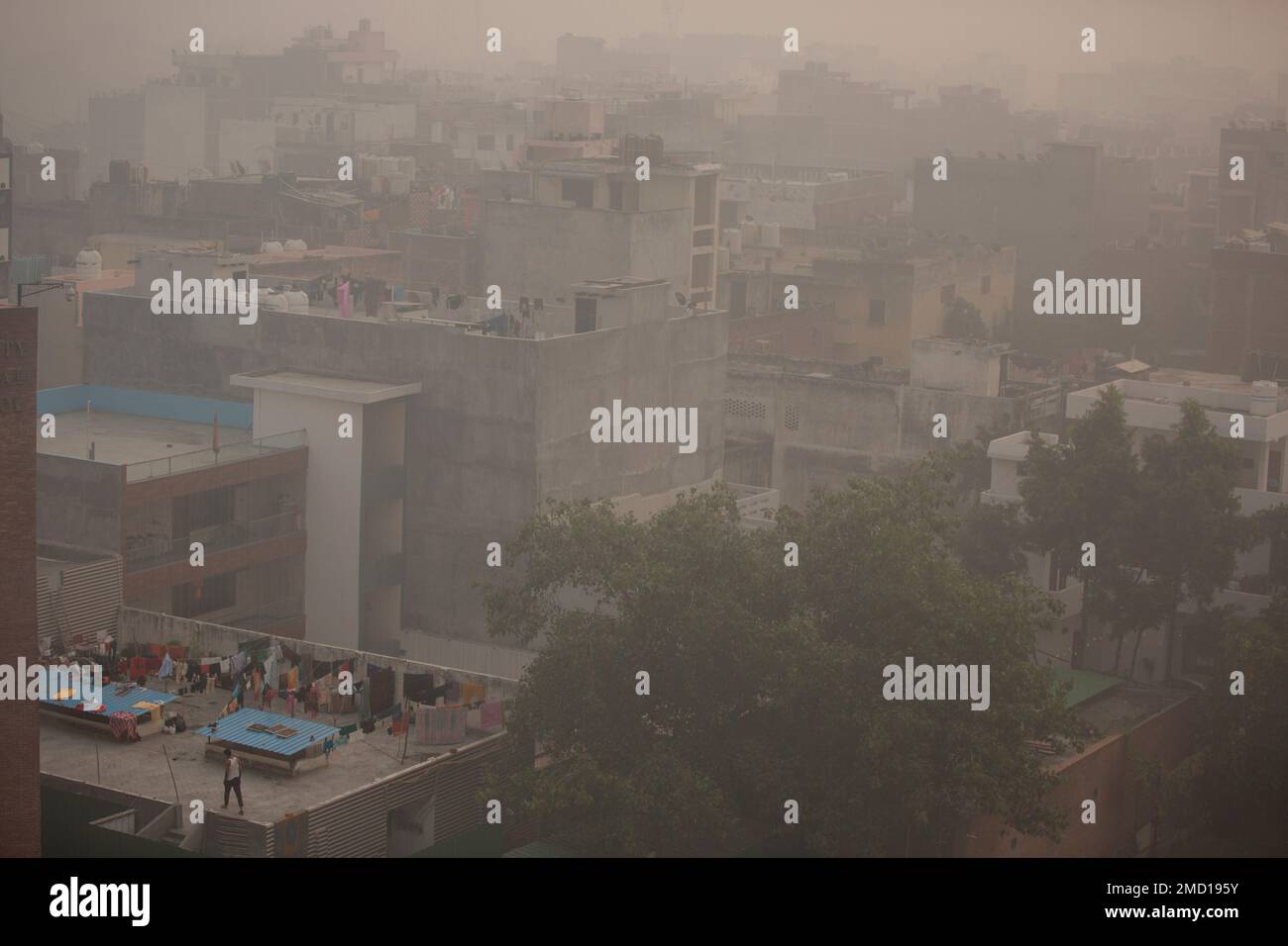 Morning haze and smog envelops the skyline in New Delhi, India, Friday ...