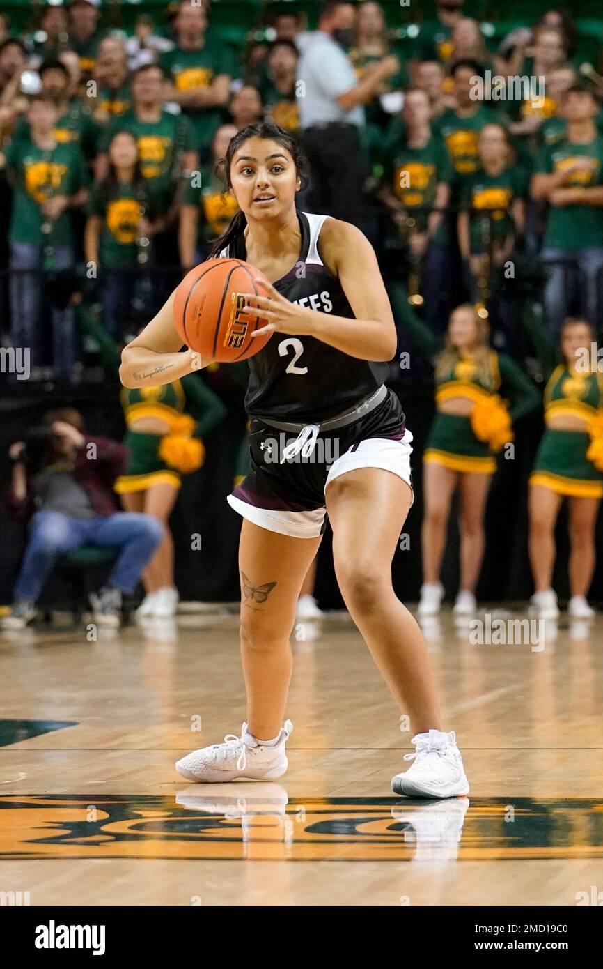 West Texas A&M guard Azia Himeur makes a pass during an exhibition NCAA ...