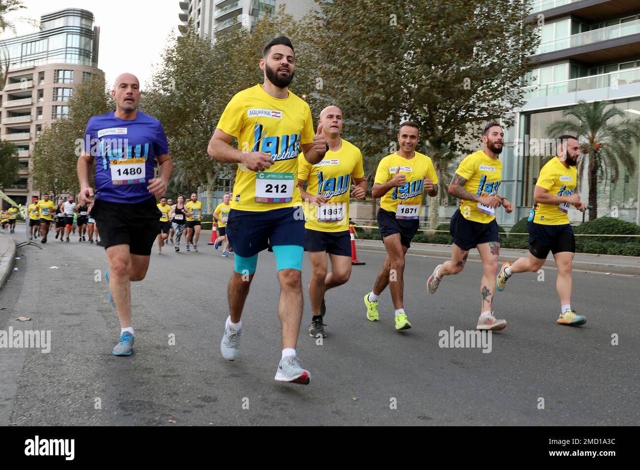 Runners compete in the 42 kilometer (26 mile) Beirut International ...