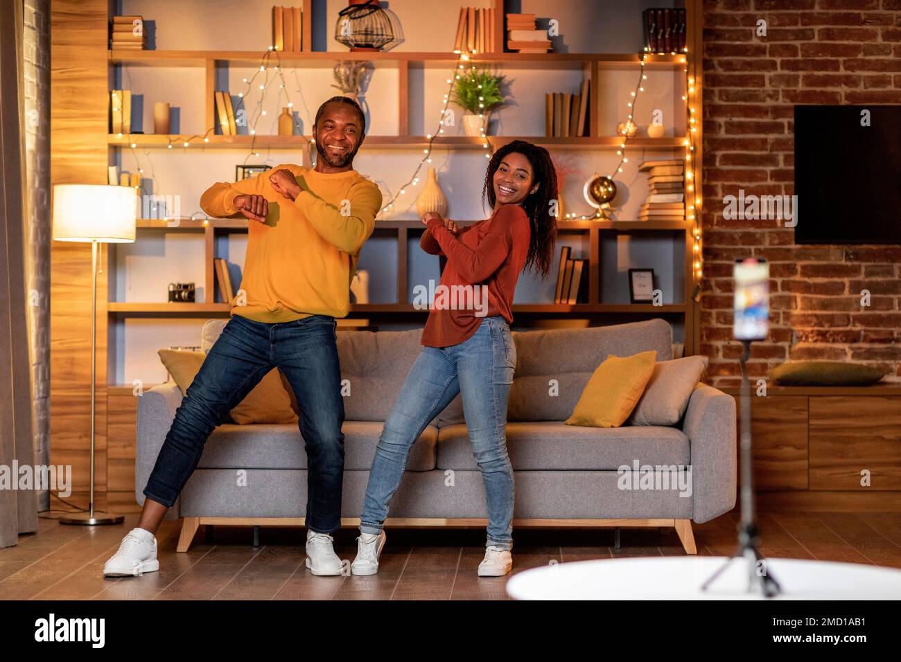 Woman recording dance video man hi-res stock photography and images - Alamy