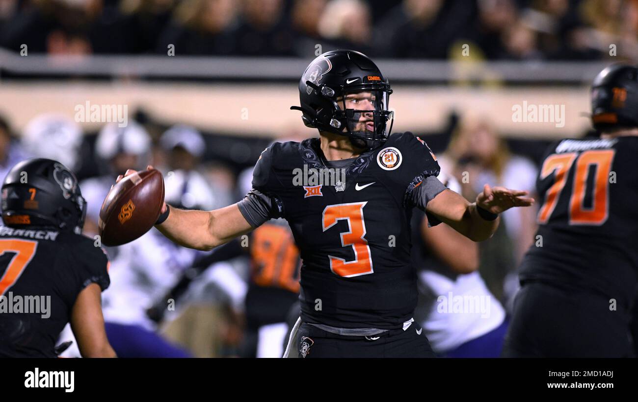 Oklahoma State quarterback Spencer Sanders (3) looks for a receiver ...