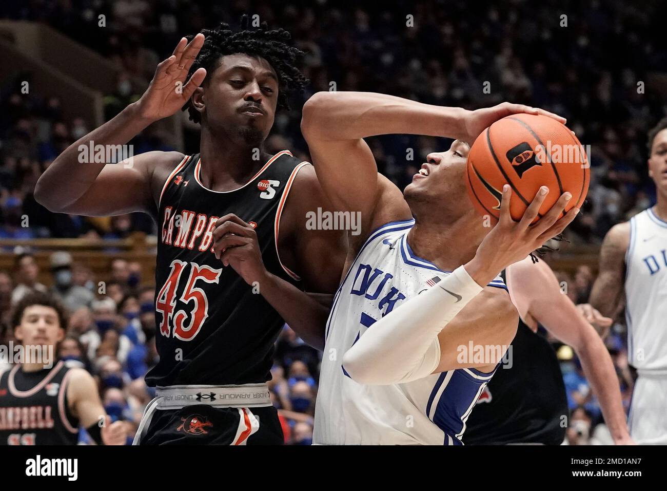 Campbell guard Cedric Henderson Jr. (45) guards Duke forward Wendell ...
