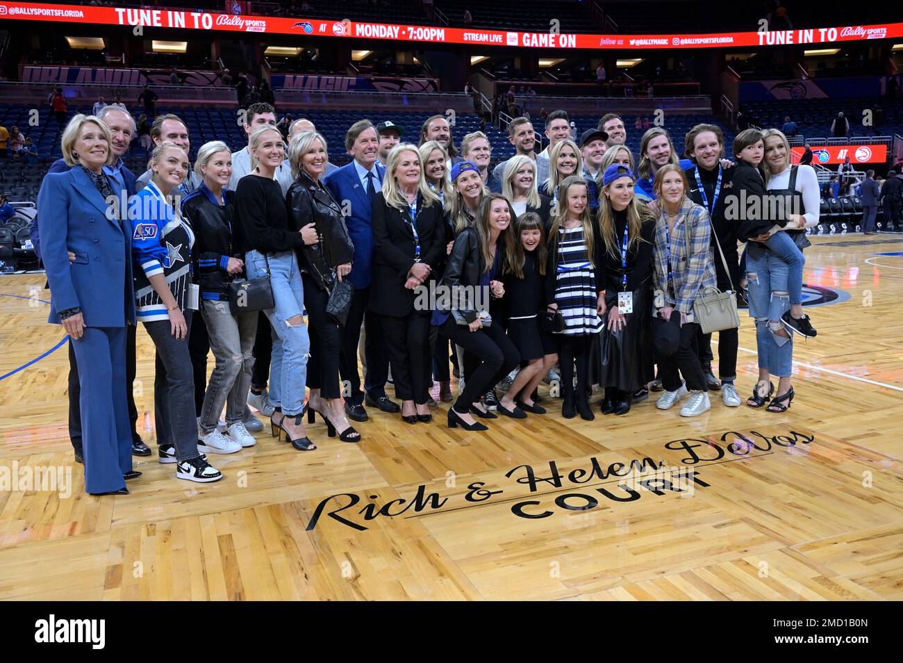 DeVos family members, including Dick DeVos, second from left, and ...