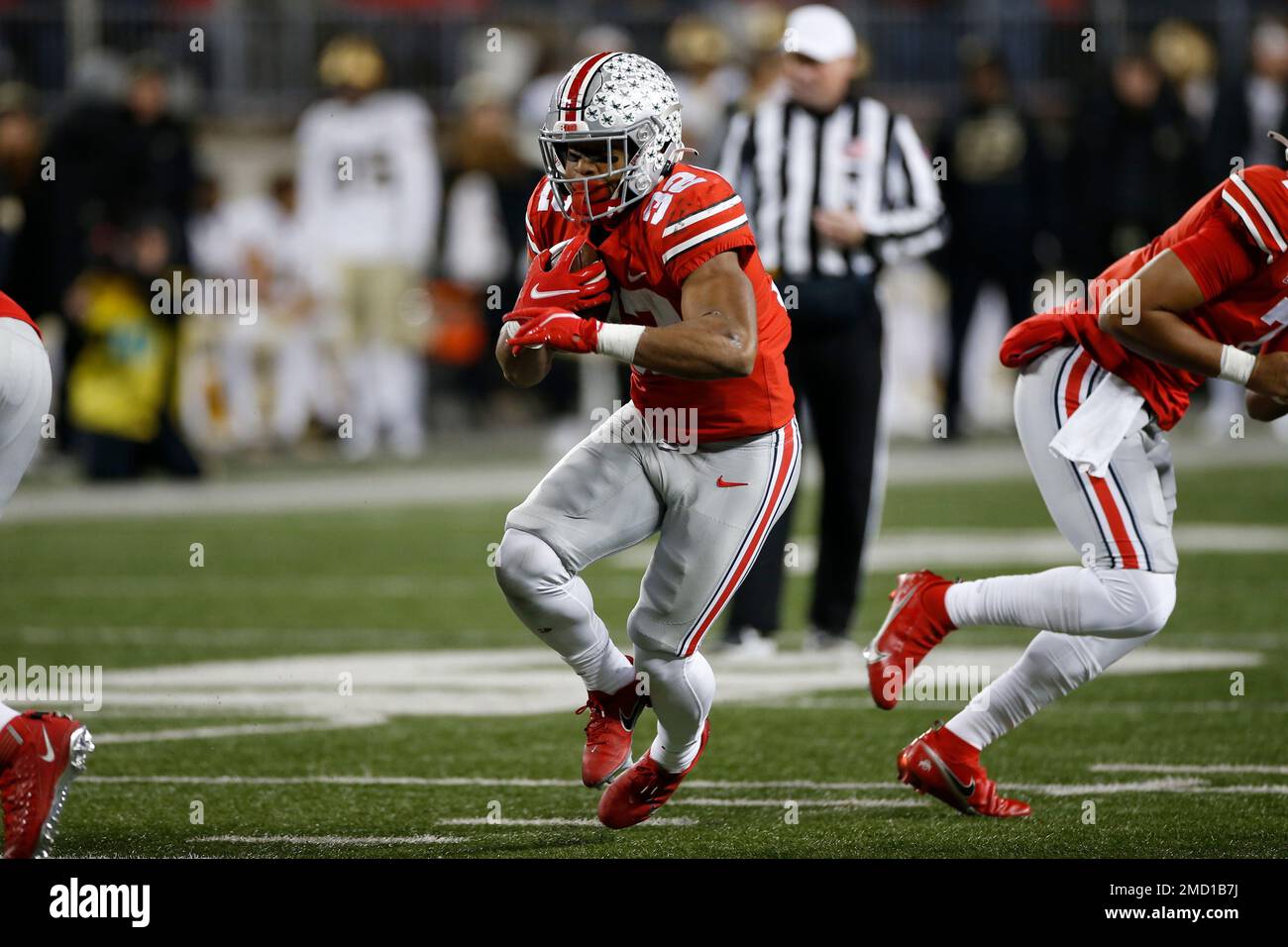Ohio State running back TreVeyon Henderson plays against Purdue during ...