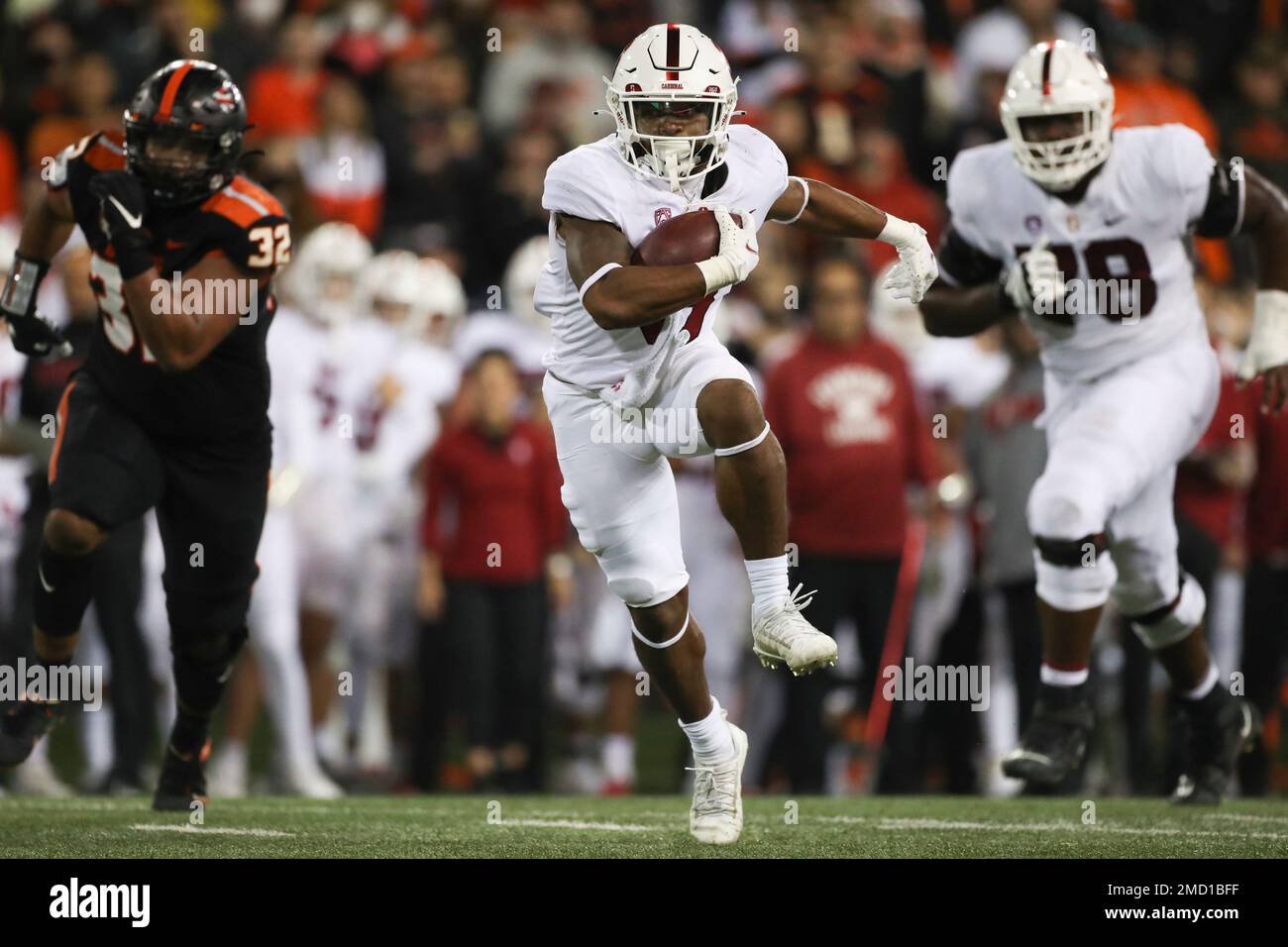 Stanford running back Nathaniel Peat (8) rushes 18 yards for a ...