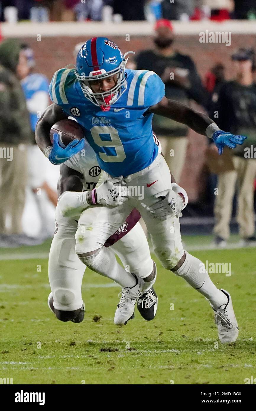Mississippi running back Jerrion Ealy (9) is tackled from behind by a ...