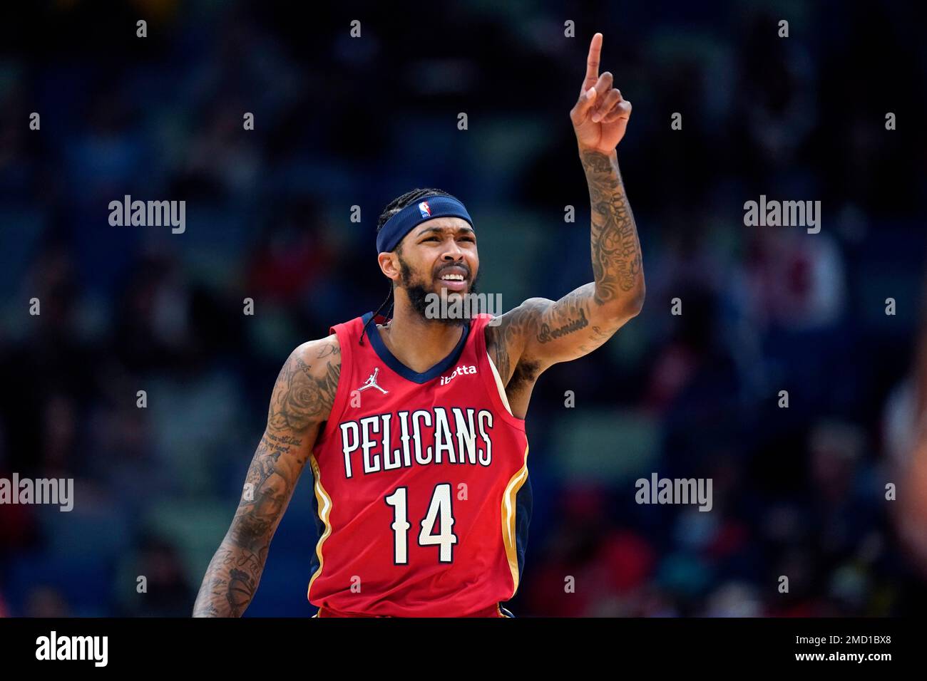 New Orleans Pelicans forward Brandon Ingram (14) gestures as he moves ...