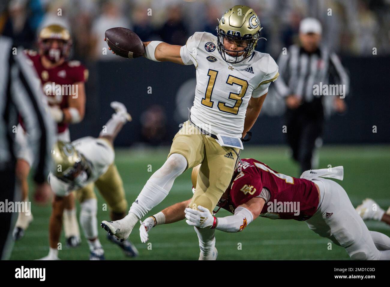 Georgia Tech quarterback Jordan Yates (13) runs the ball past Boston ...