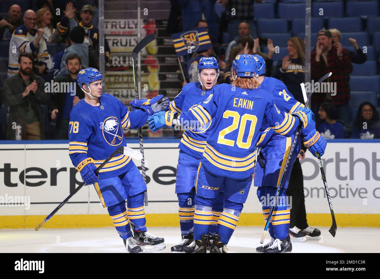 Buffalo Sabres left wing Jeff Skinner, center, celebrates with ...
