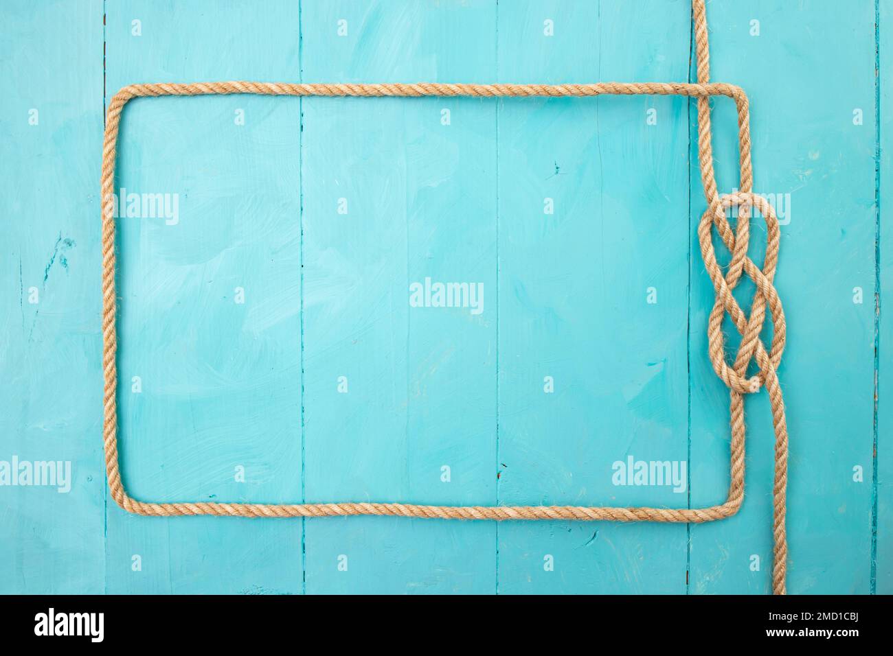 Jute rope rectangular frame, with a knot on blue painted boards, navy ...