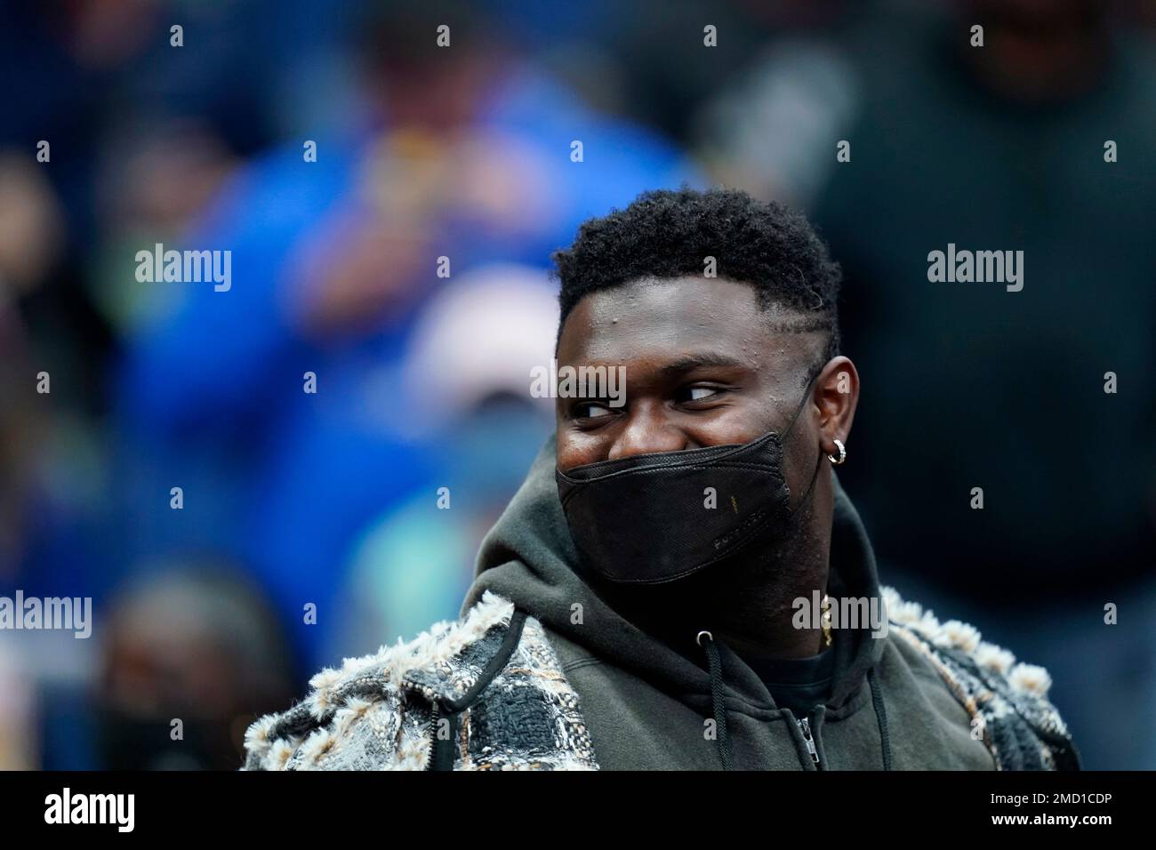 New Orleans Pelicans forward Zion Williamson sits on the bench in ...