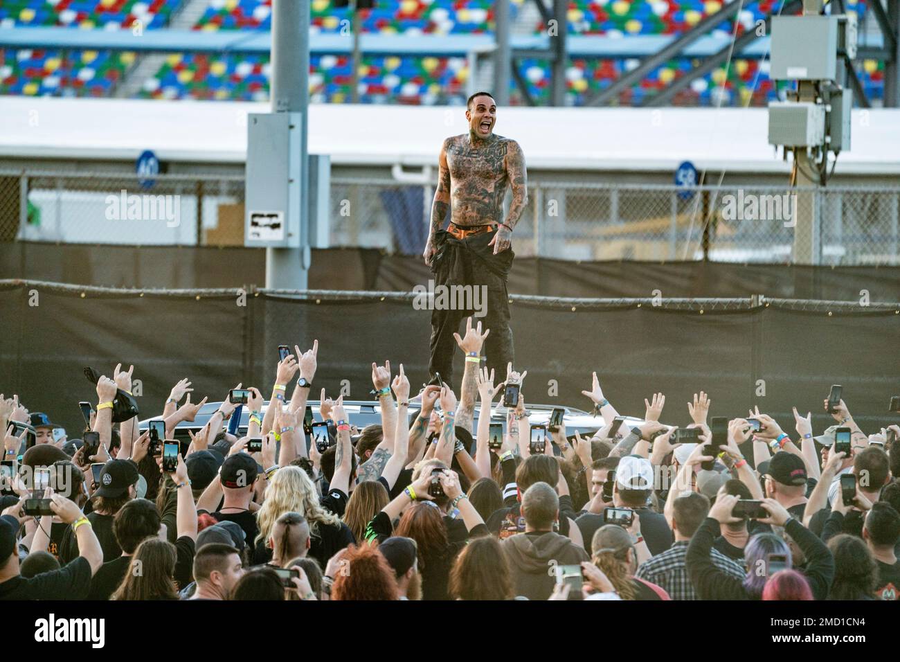 Jason Aalon Butler of Fever 333 performs on a car at Welcome to ...
