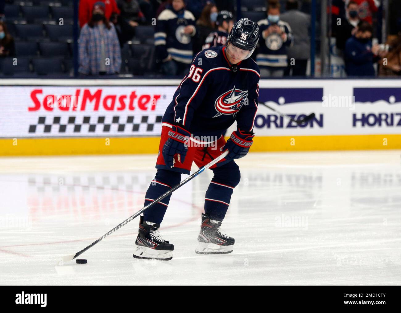 Columbus Blue Jackets forward Jack Roslovic skates before an NHL hockey ...