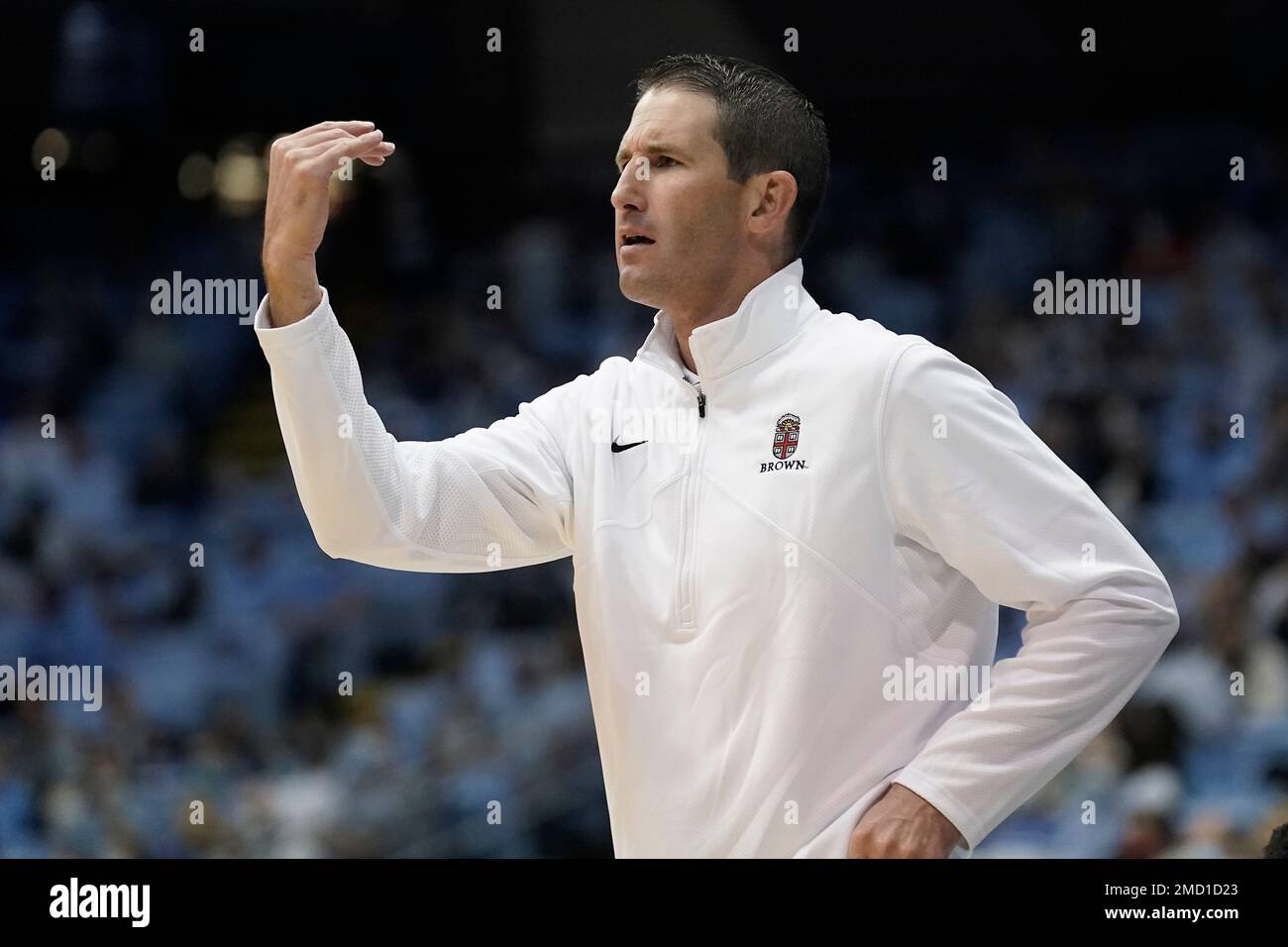 Brown head coach Mike Martin reacts during the first half of an NCAA ...