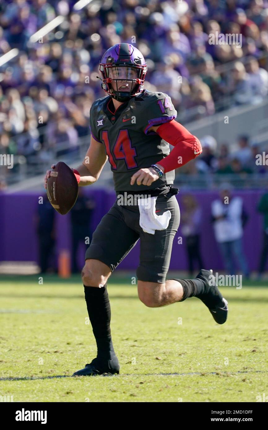 TCU quarterback Chandler Morris scrambles out of the pocket during an ...
