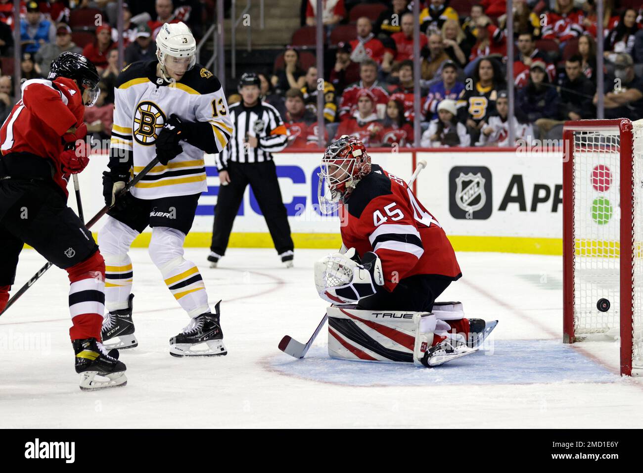 New Jersey Devils goaltender Jonathan Bernier gives up a goal by Boston ...