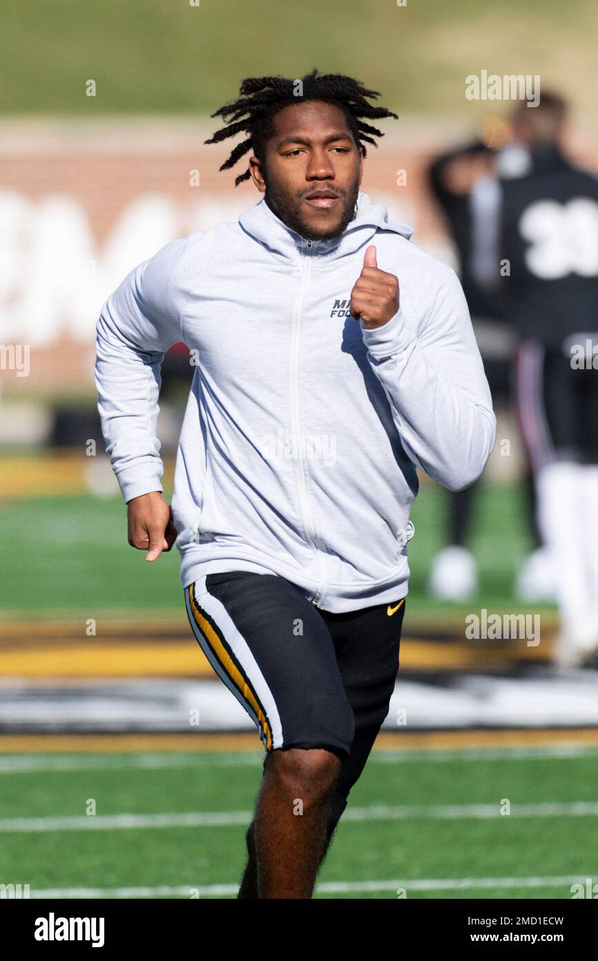 Missouri running back Tyler Badie warms up before an NCAA college ...