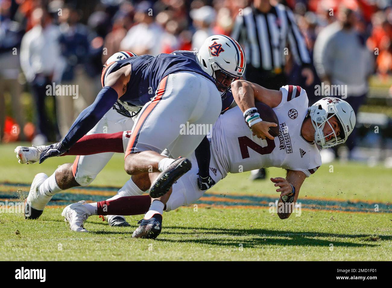 Mississippi State quarterback Will Rogers (2) dives for extra yardage ...