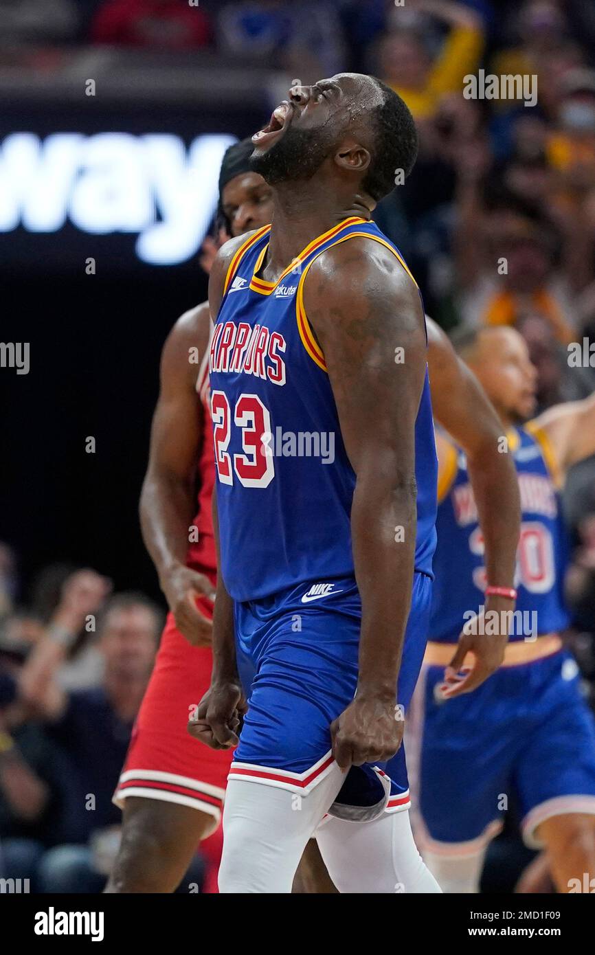 Golden State Warriors forward Draymond Green (23) reacts after scoring against the Chicago Bulls ...