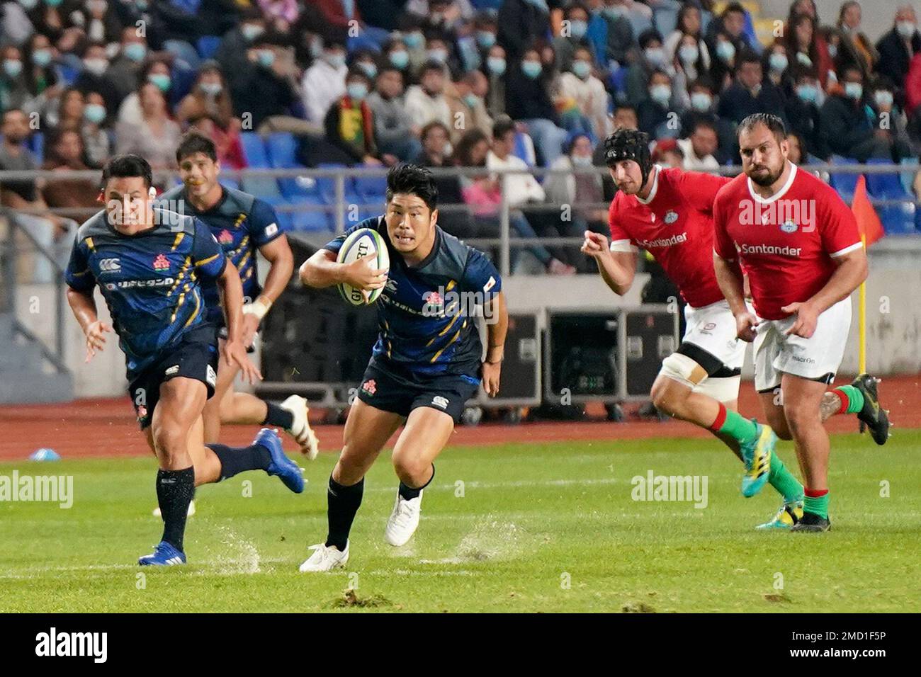 Japan's Shogo Nakano runs with the ball during a rugby union ...