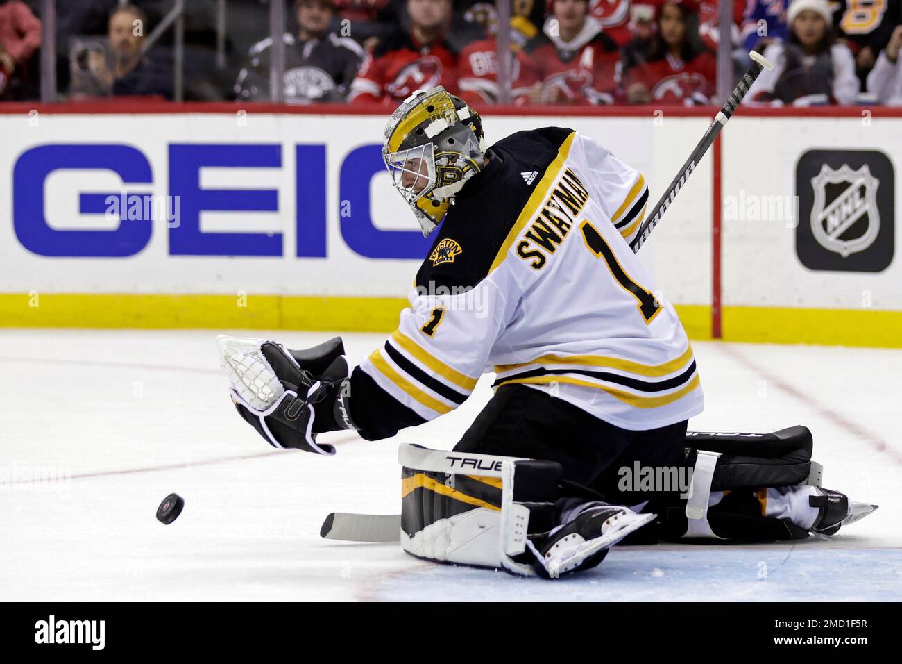 Boston Bruins goaltender Jeremy Swayman (1) makes a save against the ...