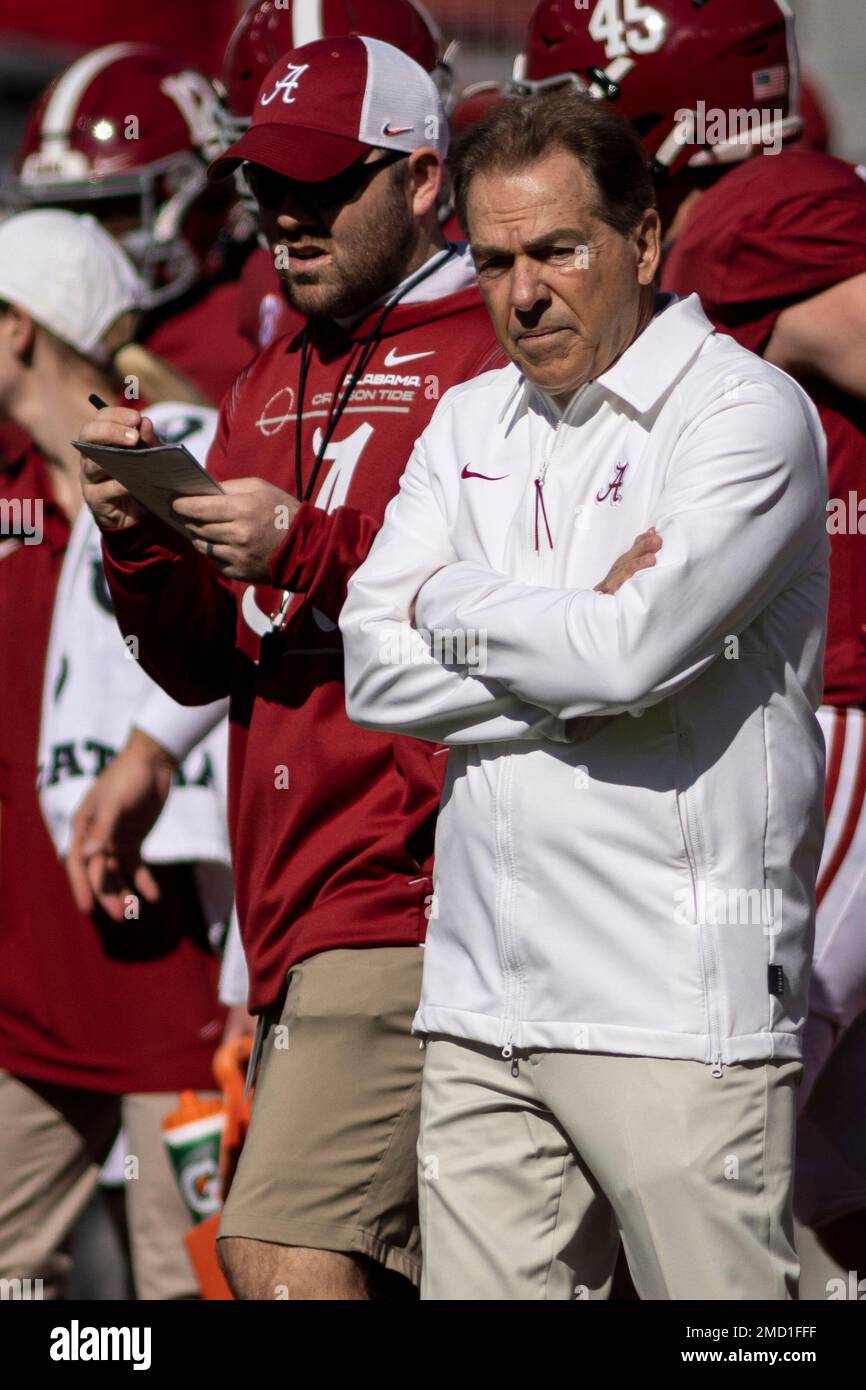 Alabama head coach Nick Saban, right, watches warm-ups before an NCAA ...