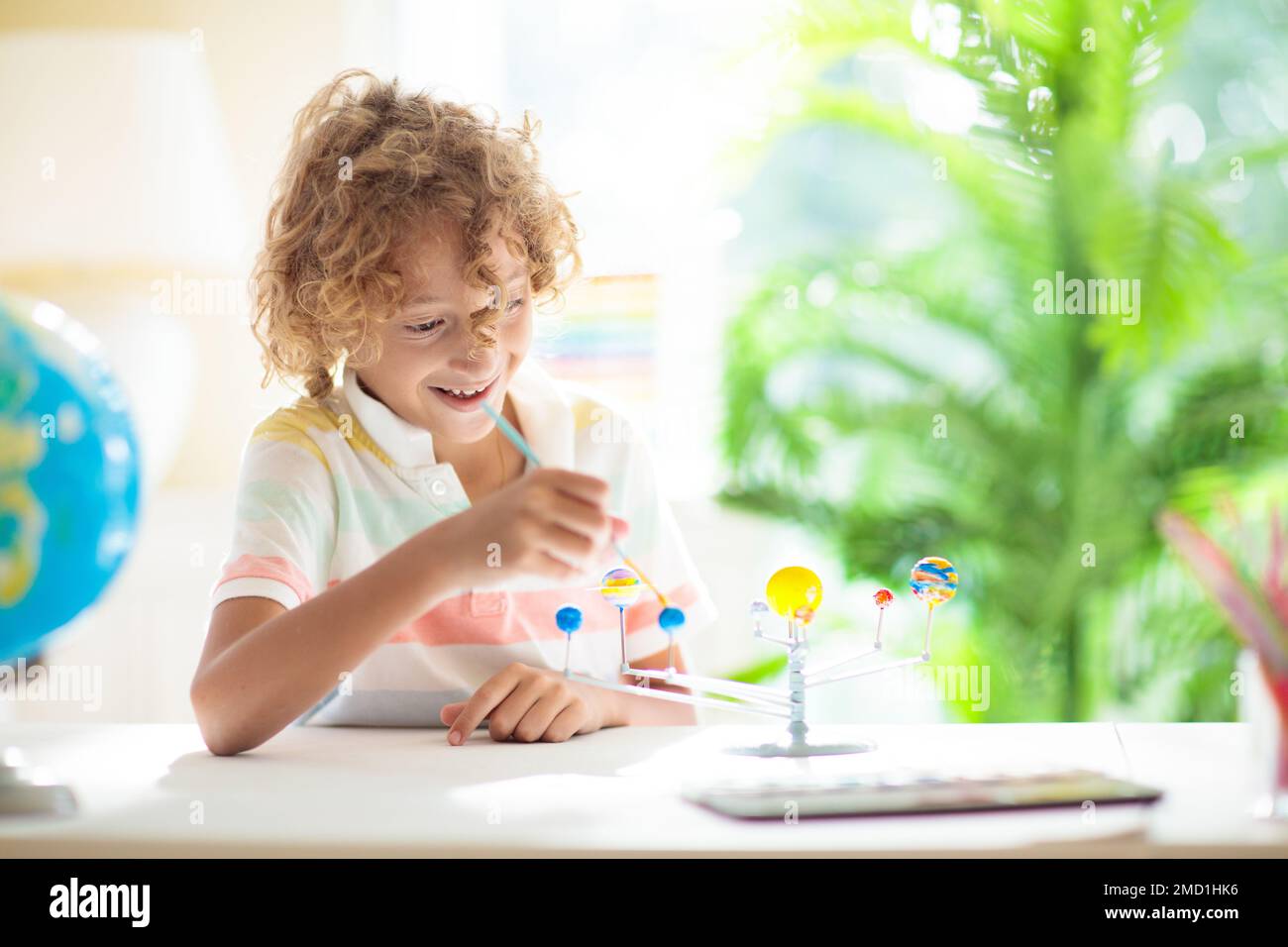 Child with solar system model. Kids planetarium. Little boy coloring ...
