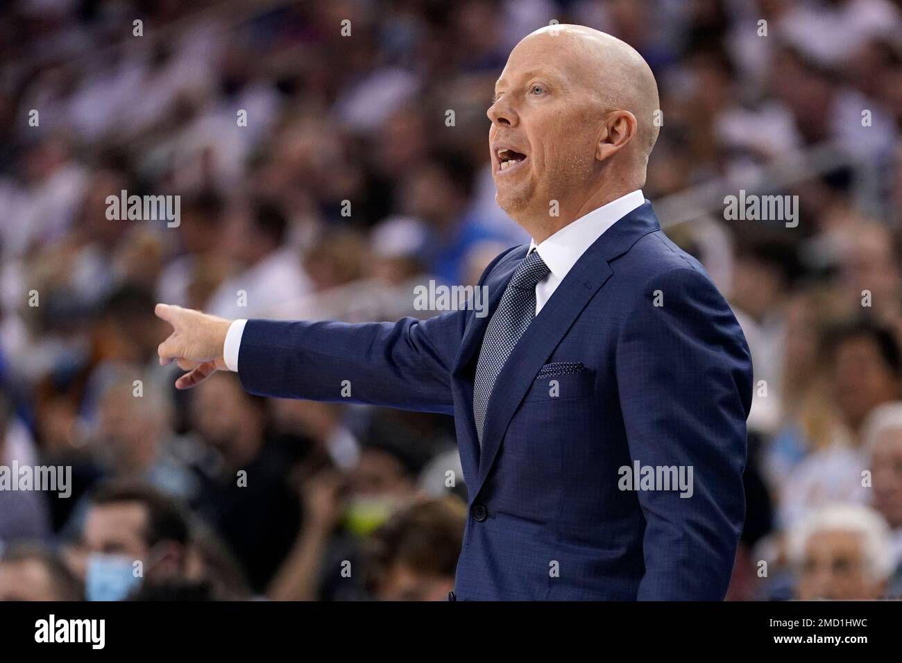 UCLA head coach Mick Cronin instructs from the bench during the first ...