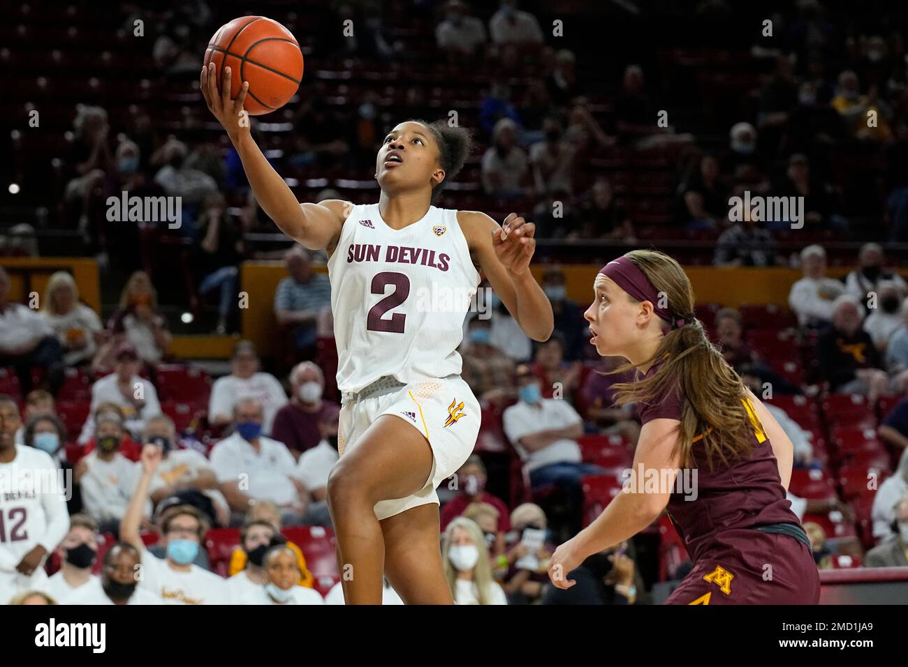 Arizona State guard Jaddan Simmons (2) drives past Minnesota guard Sara ...
