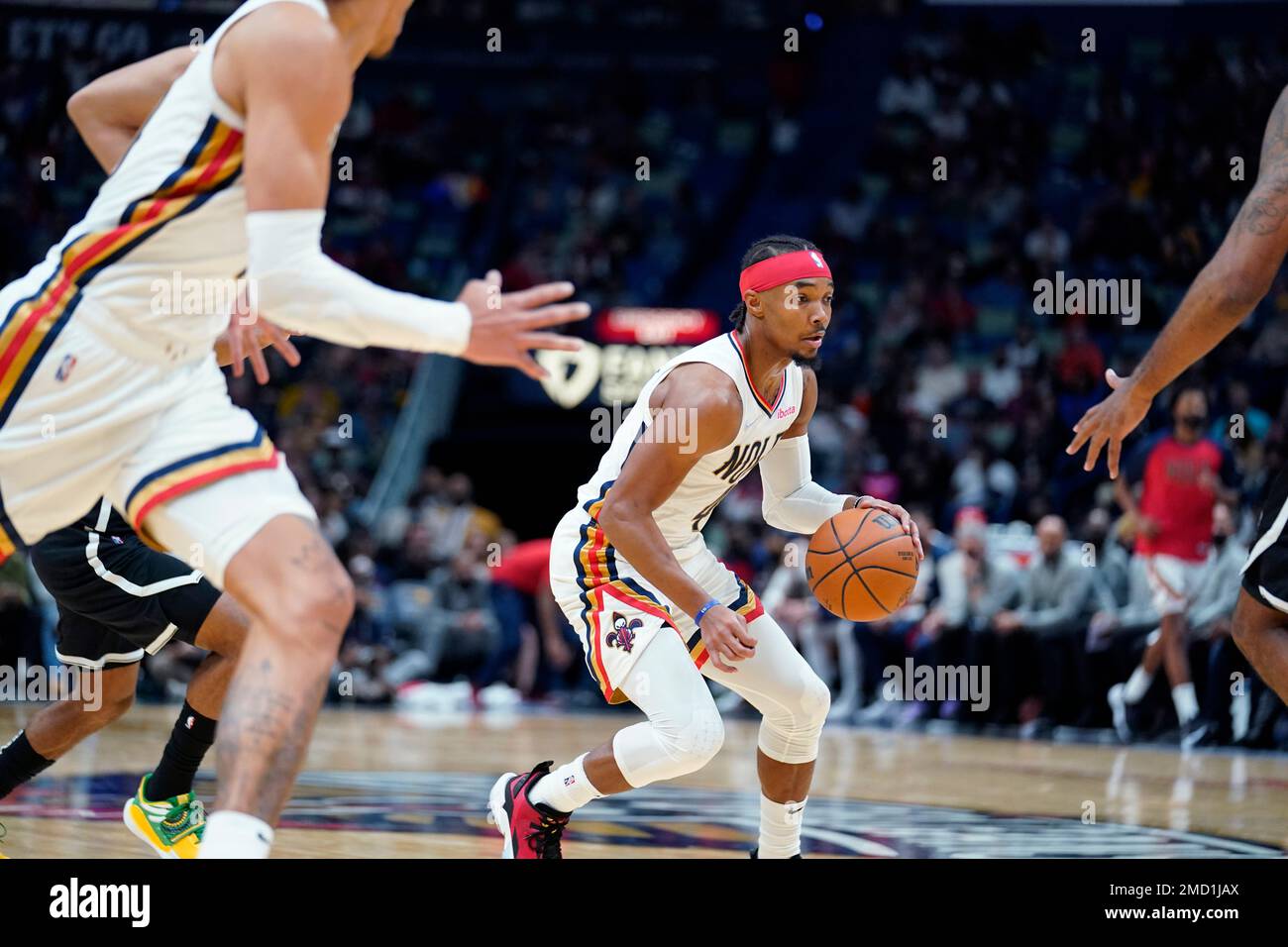 New Orleans Pelicans guard Devonte' Graham move the ball down court in ...