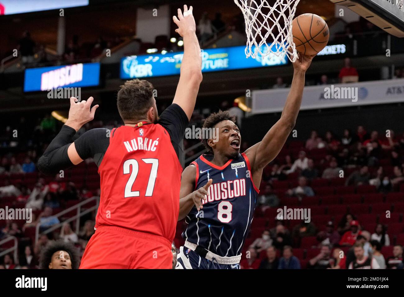 Houston Rockets forward Jae'Sean Tate shoots as Portland Trail Blazers ...