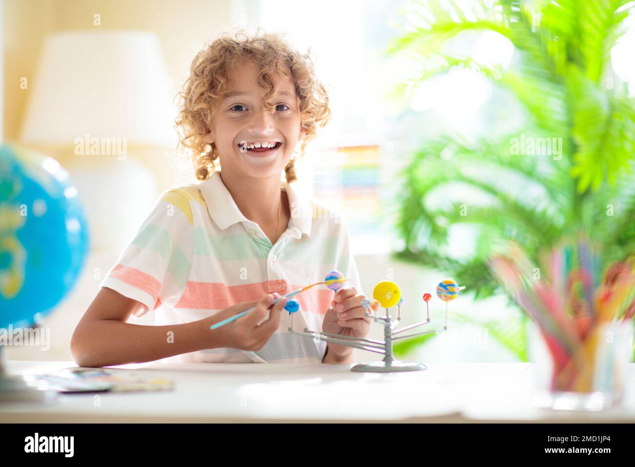 Child with solar system model. Kids planetarium. Little boy coloring ...