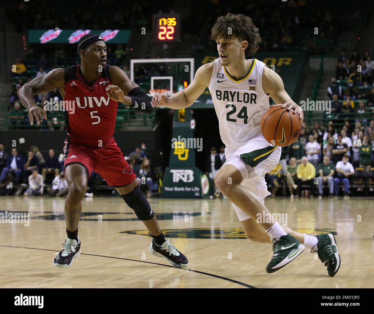Baylor guard Matthew Mayer (24) drives the ball against Incarnate Word ...