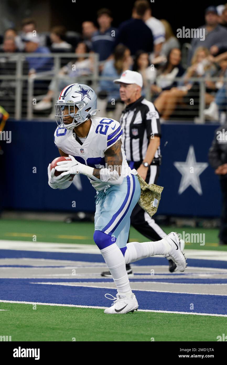 Dallas Cowboys running back Tony Pollard (20) returns a kick against ...