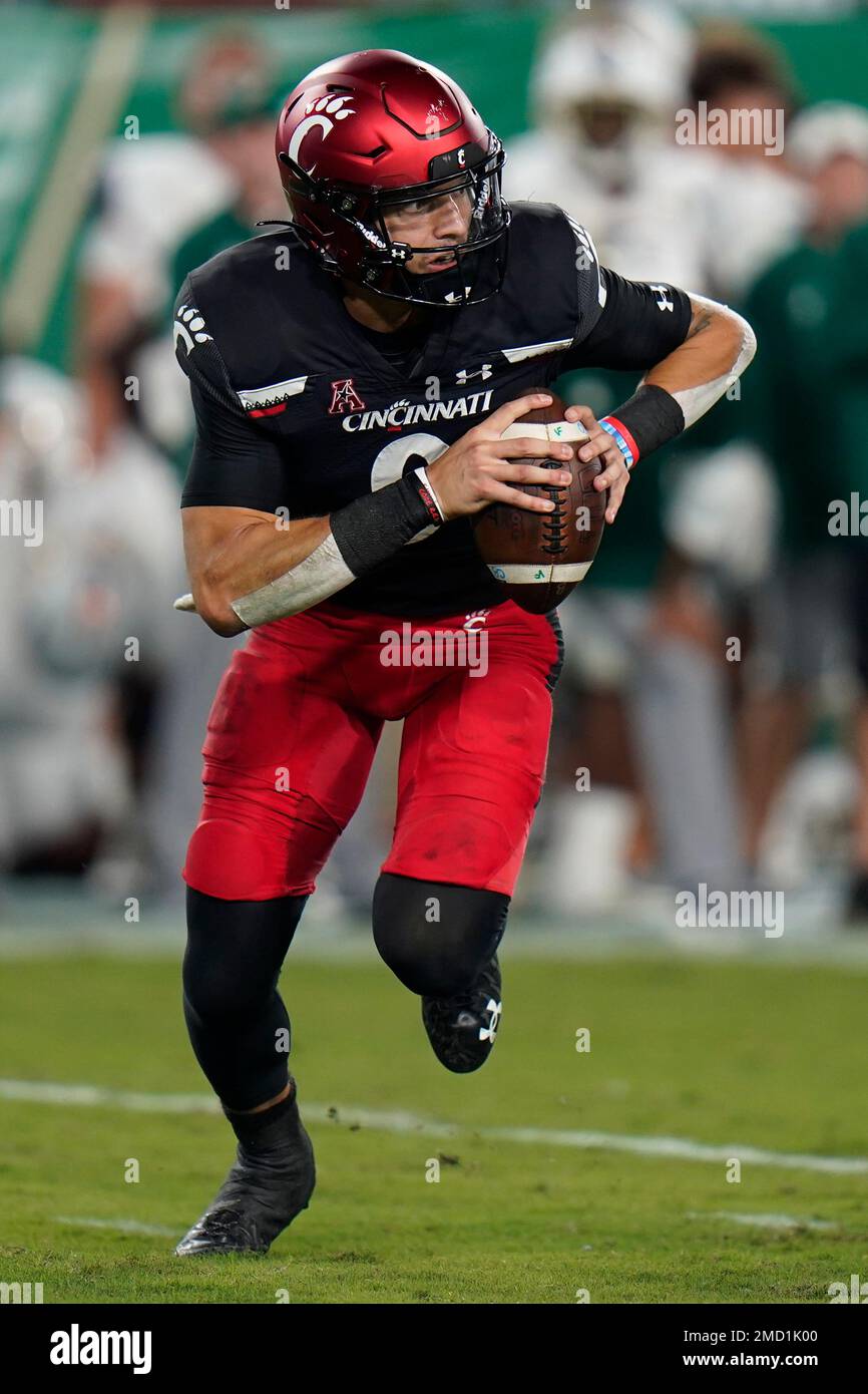 Cincinnati quarterback Desmond Ridder rolls against South Florida ...