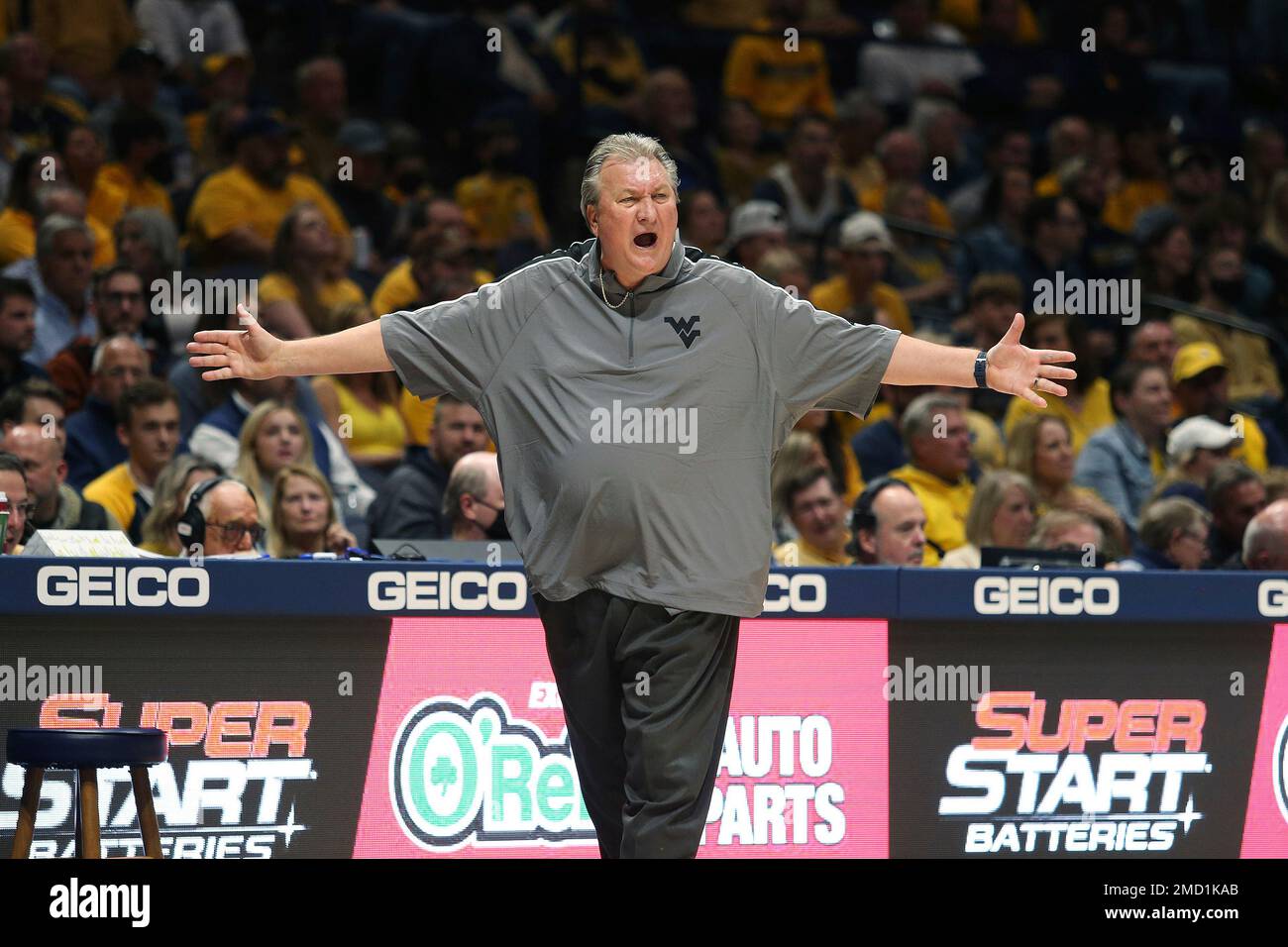 West Virginia coach Bob Huggins reacts during the first half of an NCAA ...