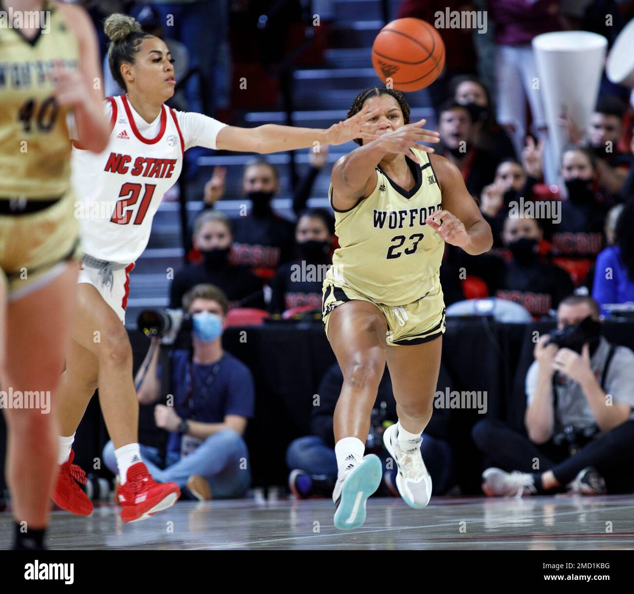 North Carolina State's Madison Hayes (21) reaches the ball passed by ...