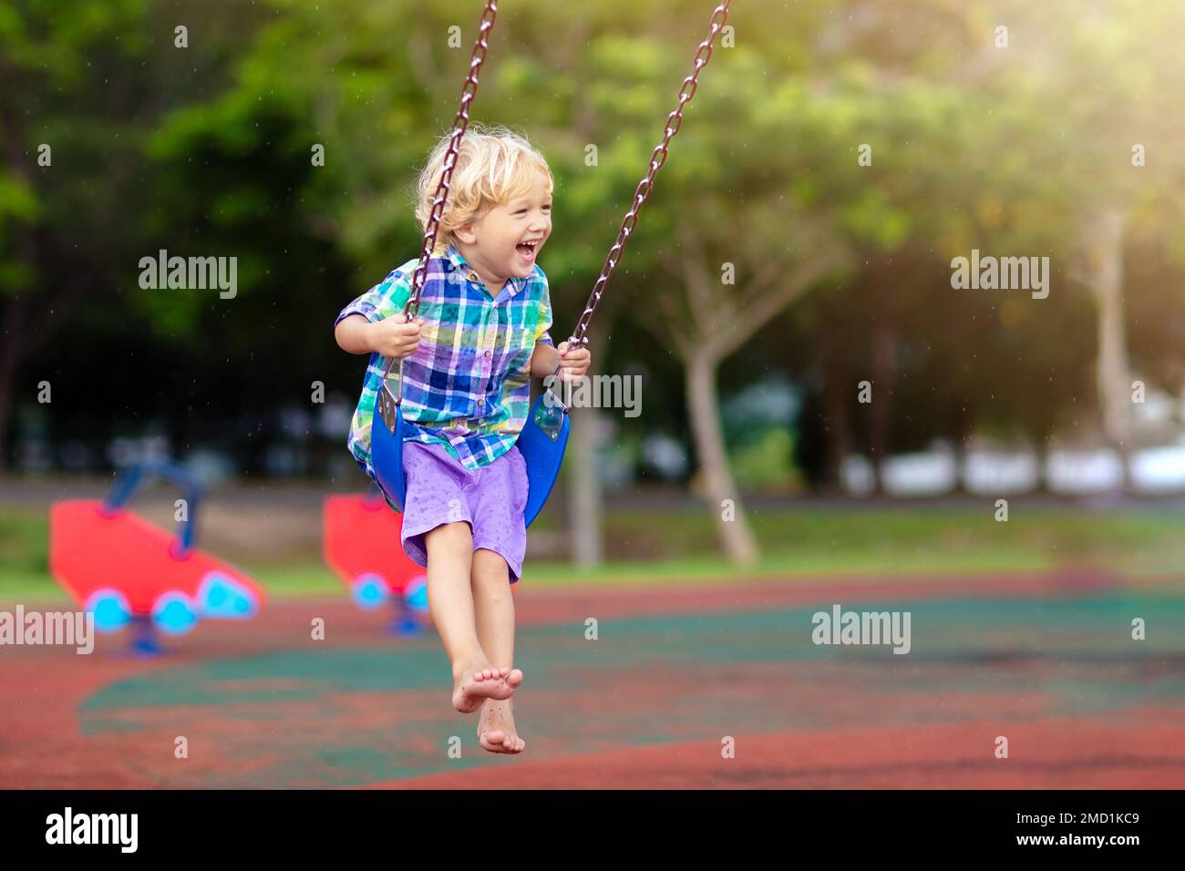 Slide playground rain hi-res stock photography and images - Alamy