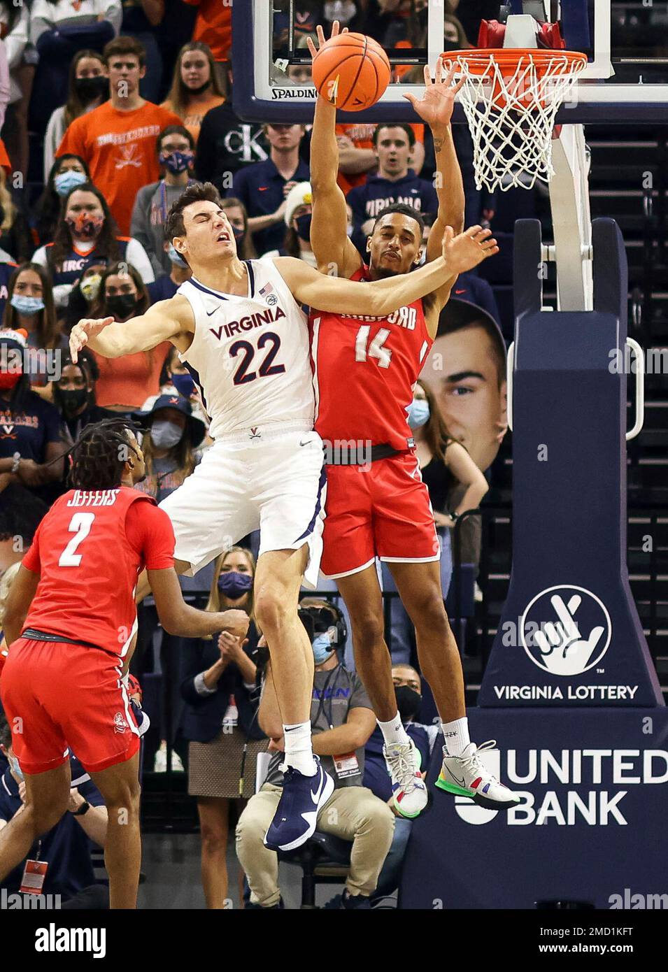 Virginia center Francisco Caffaro (22) is fouled by Radford forward ...