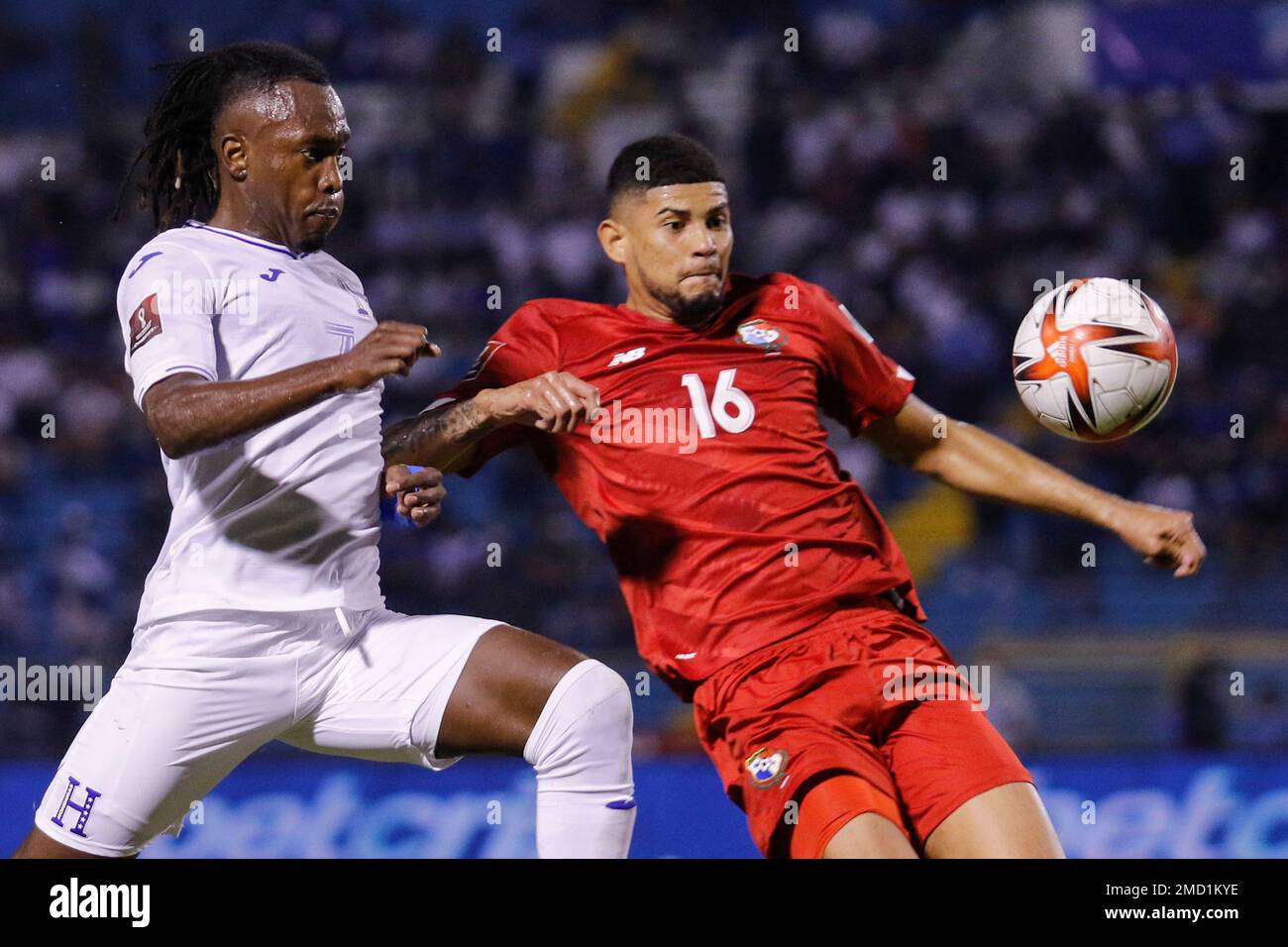 Honduras' Alberth Elis, left, and Panama's Andres Andrade compete for the ball during a ...