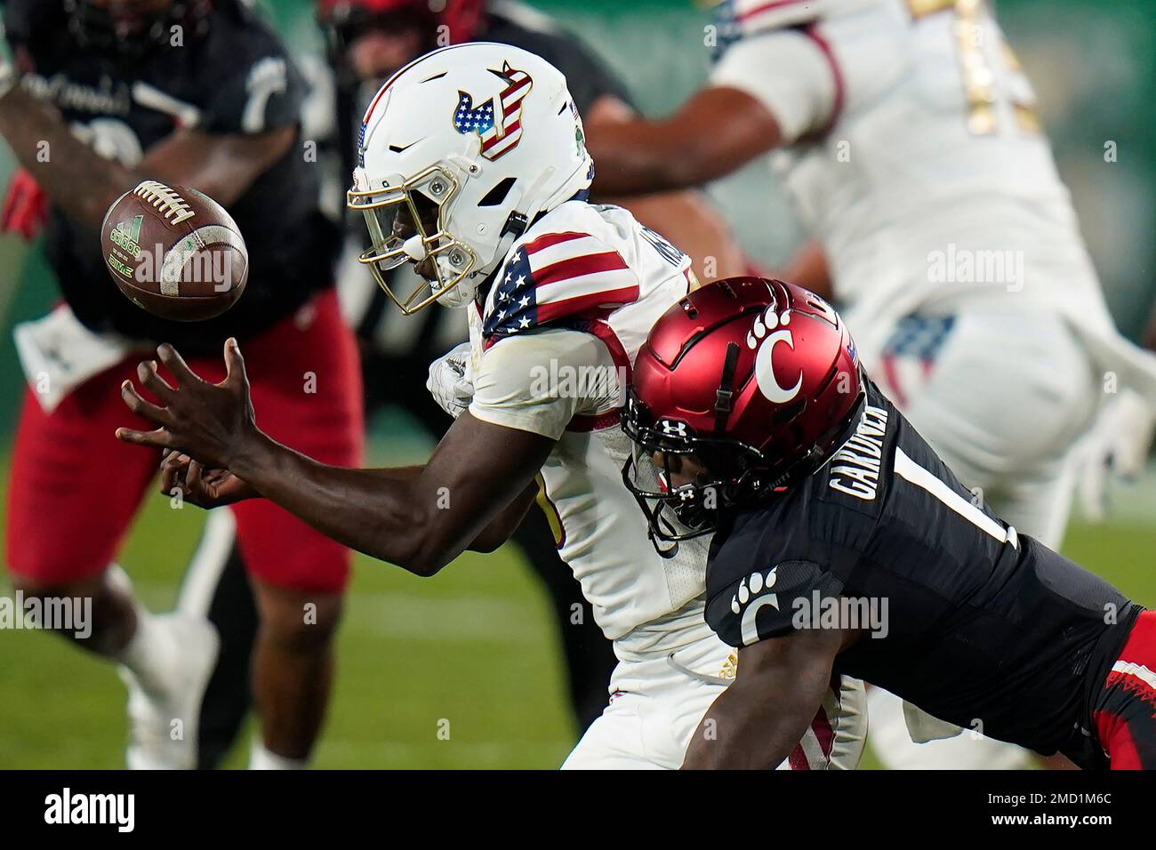 South Florida quarterback Timmy McClain (9) fumbles the ball as he is ...
