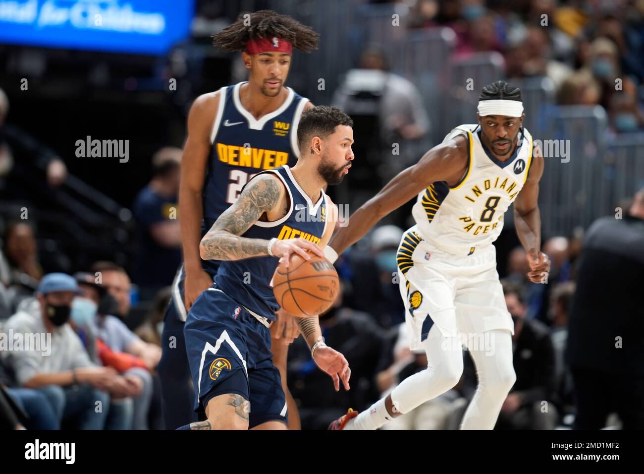 Denver Nuggets guard Austin Rivers (25) and Indiana Pacers forward ...