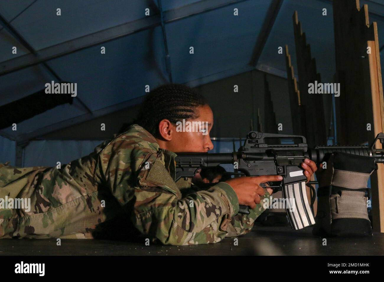 New Cadets practice how to properly aim an M4 Carbine in the prone ...