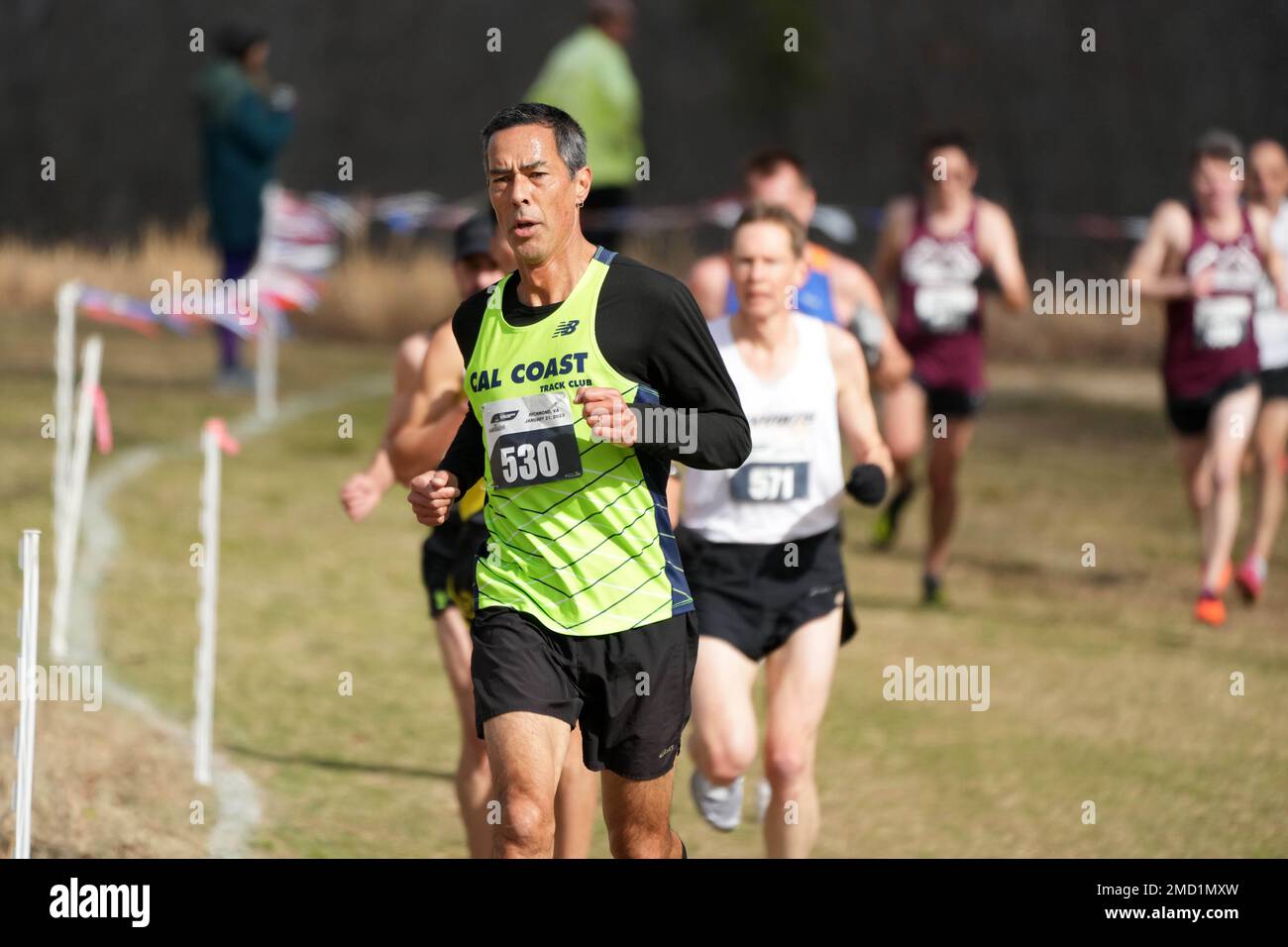 Christian Cushing-murray (530) runs in the Masters Men's race during ...