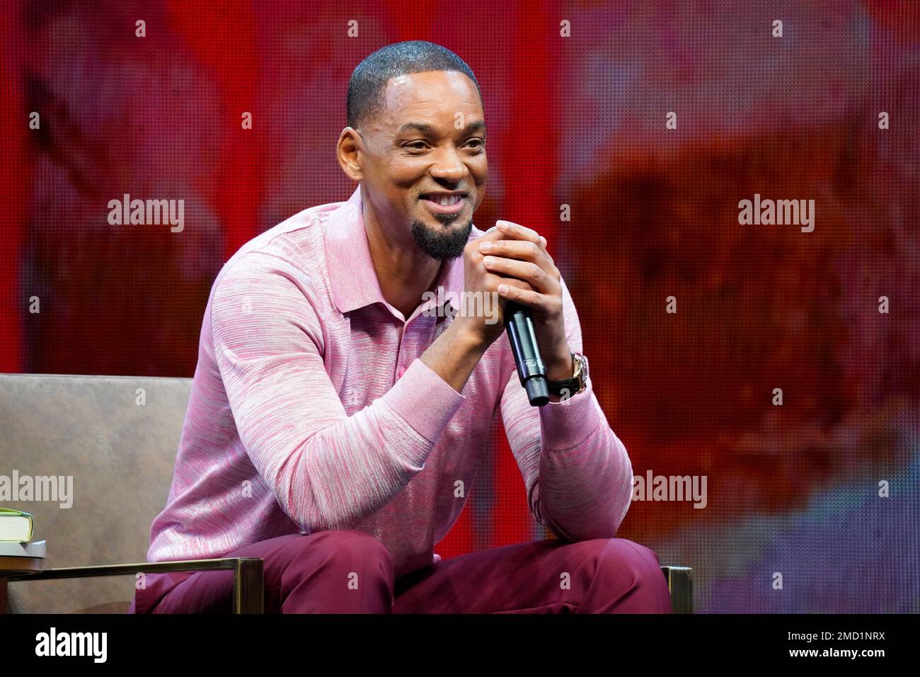 Will Smith speaks with Mark Manson during a tour to promote his new book "Will" on Wednesday ...
