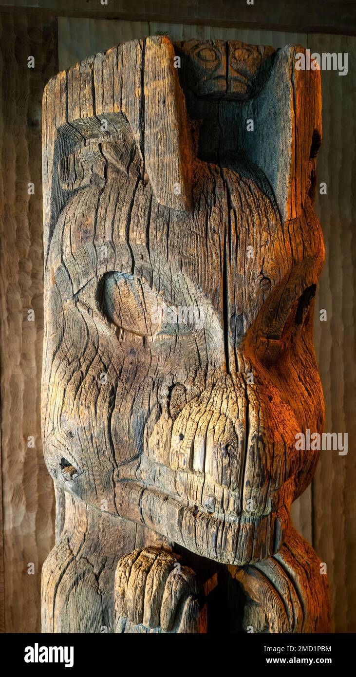 Wooden carving of a totem pole from west of Canada Stock Photo - Alamy