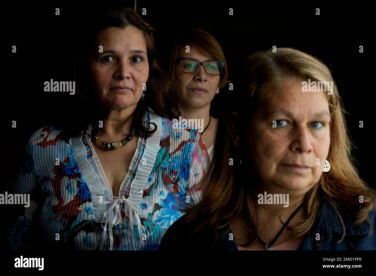 Lucia Gimenez, from left, Alicia Torancio, and Beatriz Delgado, former ...