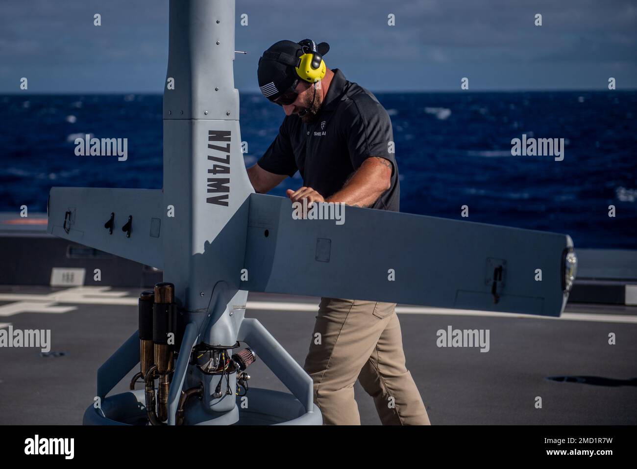 220712-N-YN807-2054 PACIFIC OCEAN (July 12, 2022) – A U.S. contractor ...