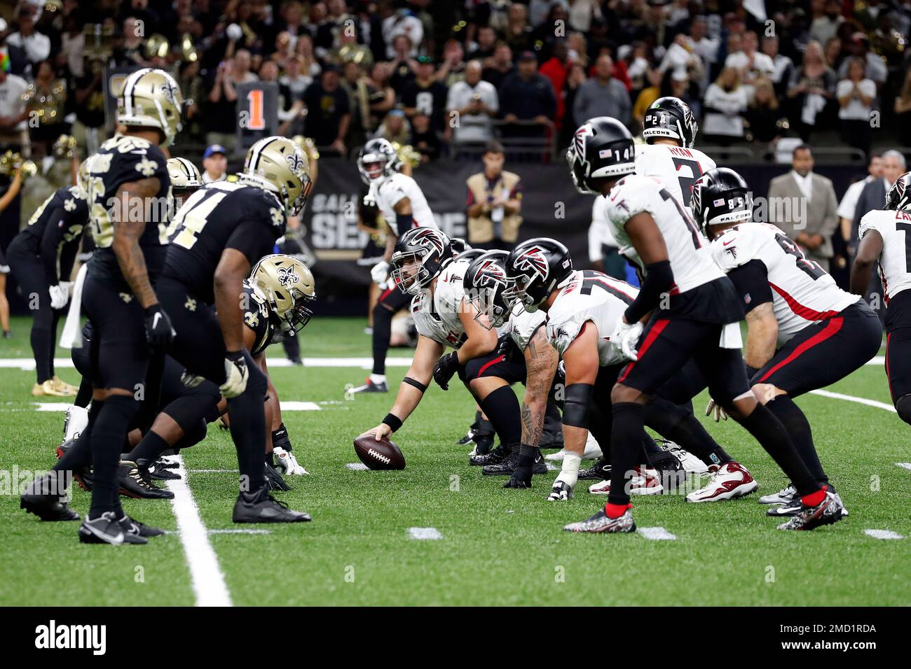 The Atlanta Falcons line up to snap the ball during an NFL football ...
